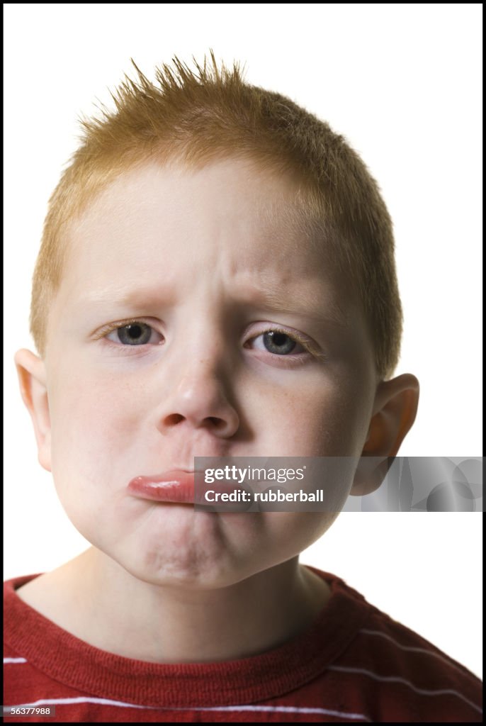 Portrait Of A Boy Pouting High-Res Stock Photo - Getty Images Portrait Of A Boy Pouting High-Res Stock Photo - Getty Images