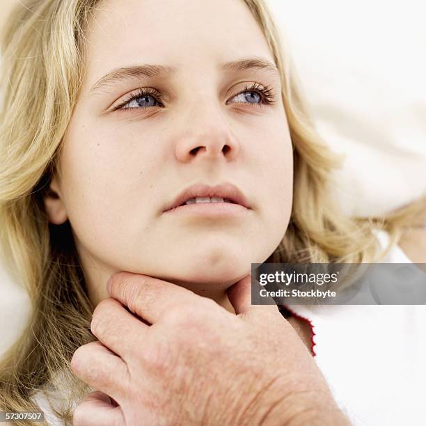 Hand On Throat Photos And Premium High Res Pictures Getty Images