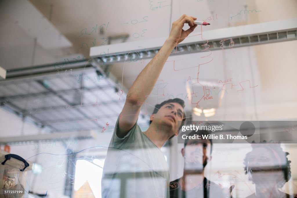 Entrepreneurs Discussing Design Of A Product High-Res Stock Photo ... Entrepreneurs Discussing Design Of A Product High-Res Stock Photo ...