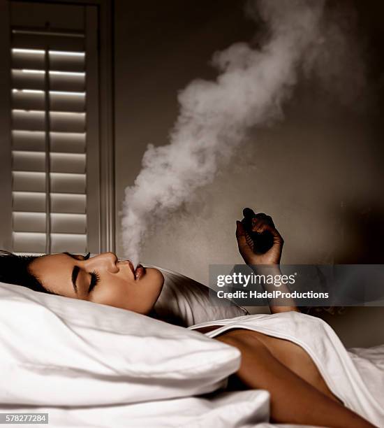 Smoking In Bed Photos And Premium High Res Pictures Getty Images