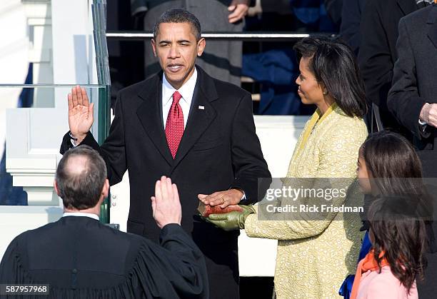 Barack Obama Is Sworn In By Chief Justice John Roberts As The 44th