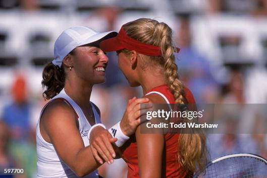 Martina Hingis And Anna Kournikova Celebrate During The Acura Tennis