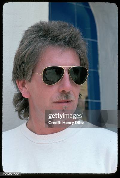 Folk Rock Singer Graham Nash Stands Against A Wall Nash Became News