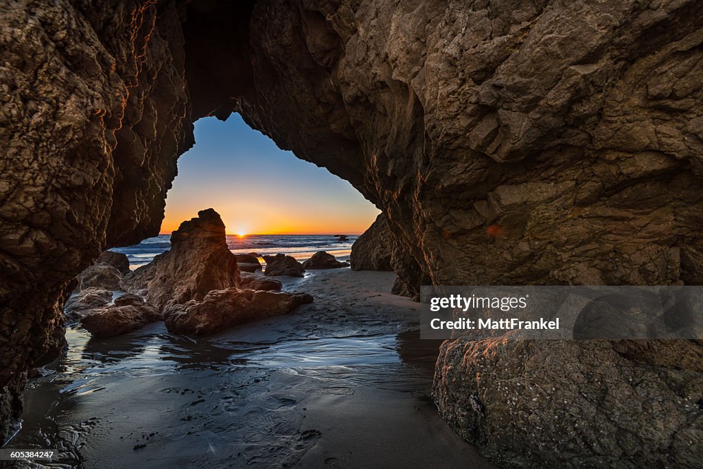 Sunset View Through Rocks El Matador Beach Malibu California America
