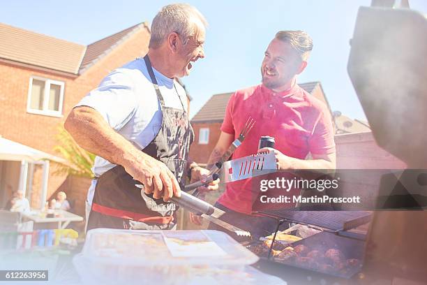Father Son Smoking Photos And Premium High Res Pictures Getty Images