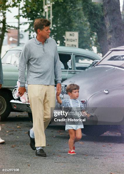 John F Kennedy Walks Holding John Jrs Hand At Hyannisport News Photo Getty Images