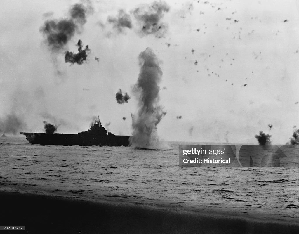 Japanese Kamikaze Crashes Alongside The Uss Essex Aircraft Carrier As