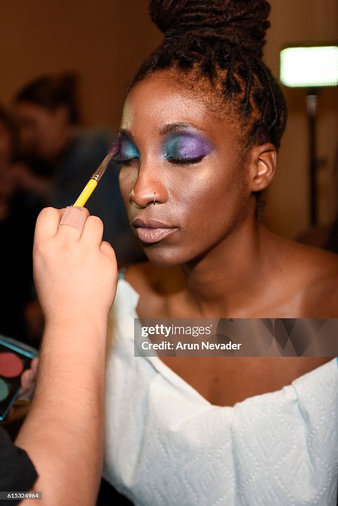 A Model Gets Ready Backstage At Art Hearts Fashion Los Angeles News