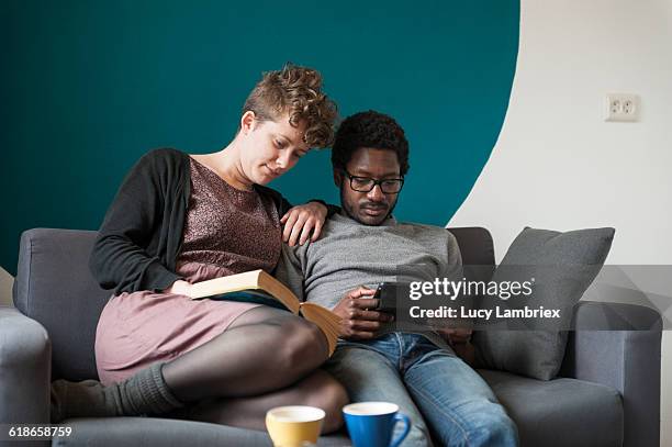 Black Couple Reading Book Photos And Premium High Res Pictures Getty