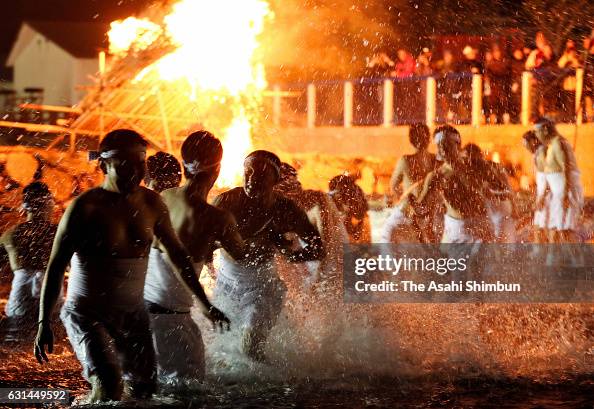 Some Fifty Men Wrapping Loincloths Splash Water During The Wakinoura