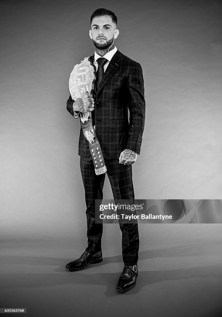 Portrait Of Ufc Bantamweight Champion Cody Garbrandt Posing With Belt