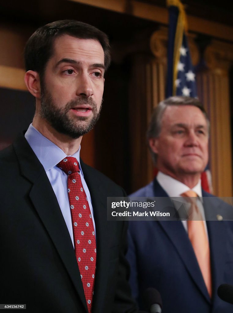 Sens. Tom Cotton and David Perdue speak to the media during a news ... Sens. Tom Cotton and David Perdue speak to the media during a news ...