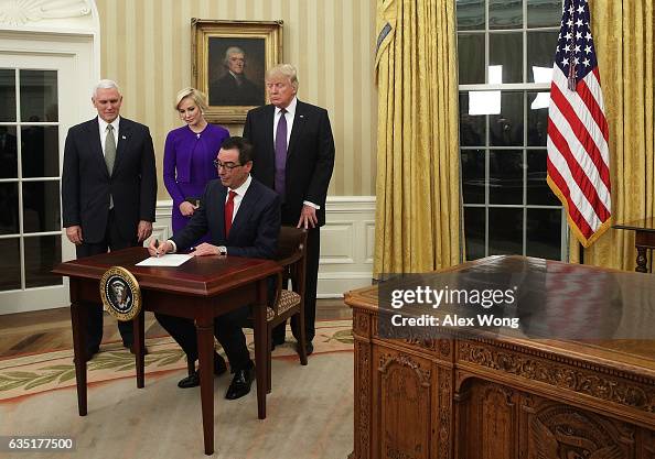 Former Investment Banker For Goldman Sachs Steven Mnuchin Signs The