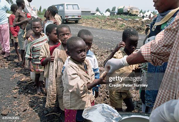 Rwanda Refugee Camp Photos and Premium High Res Pictures - Getty Images Rwanda Refugee Camp Photos and Premium High Res Pictures - Getty Images