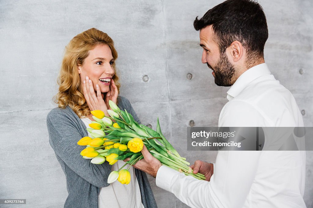 Husband Surprising His Wife With Flowers High-Res Stock Photo - Getty ... Husband Surprising His Wife With Flowers High-Res Stock Photo - Getty ...