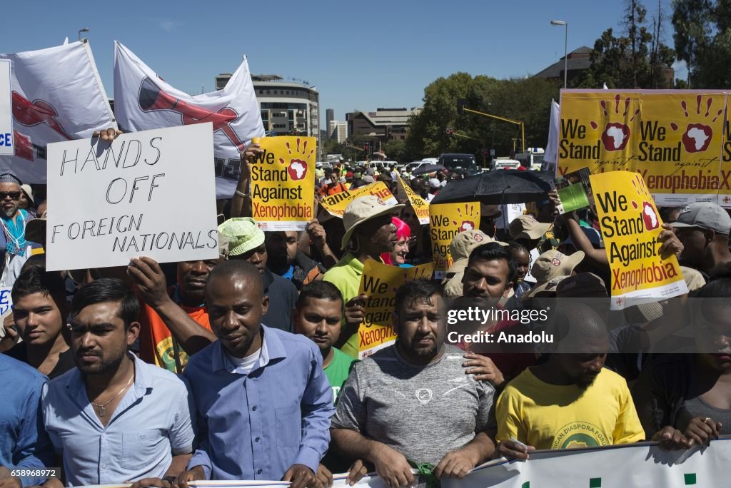Protesters Hold Banners During A Rally Held To Protest Against News