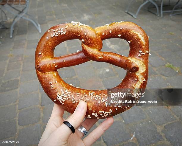 Human Pretzel Photos And Premium High Res Pictures Getty Images