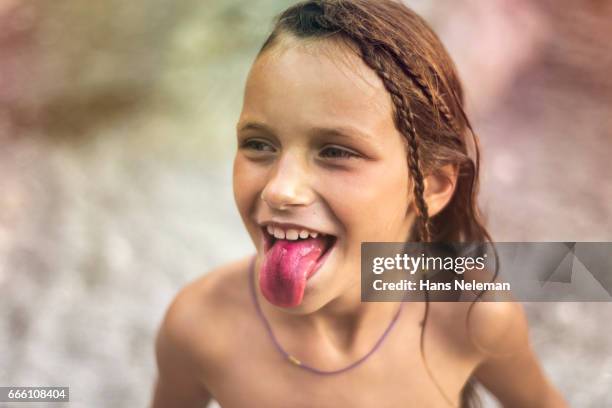 Girl Sticking Her Tongue Out Photos And Premium High Res Pictures Getty Images