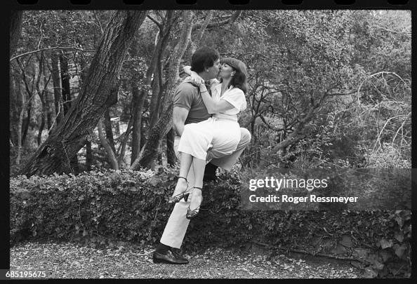 Pat McGovern kisses his wife, Lore Harp, at their home on the San ... Pat McGovern kisses his wife, Lore Harp, at their home on the San ...