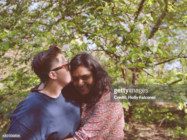 Interracial Lesbian Couple Kissing Fotografías E Imágenes De Stock