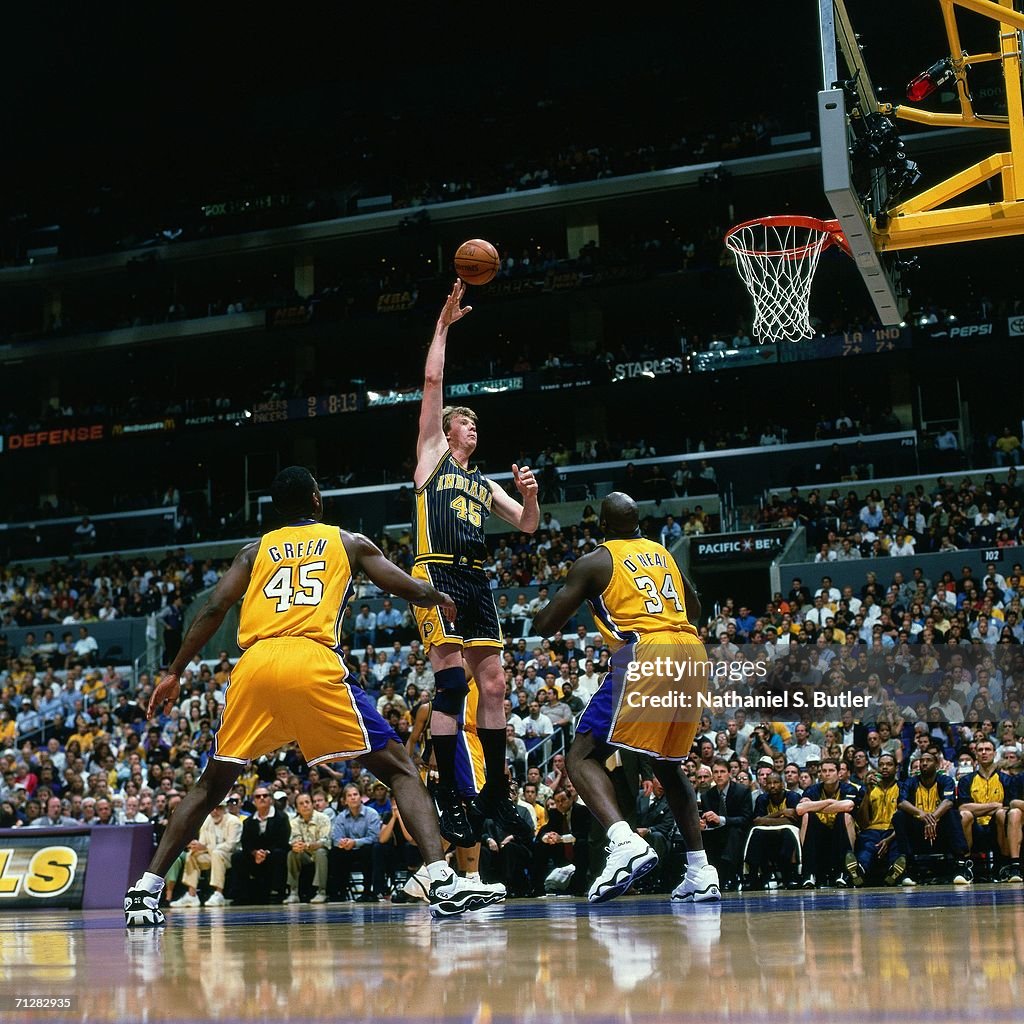Rick Smits Of The Indiana Pacers Attempts A Shot Against Shaquille