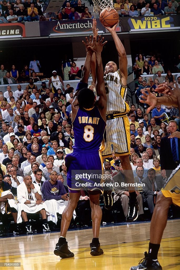 Jalen Rose Of The Indiana Pacers Attempts A Shot Against Kobe Bryant