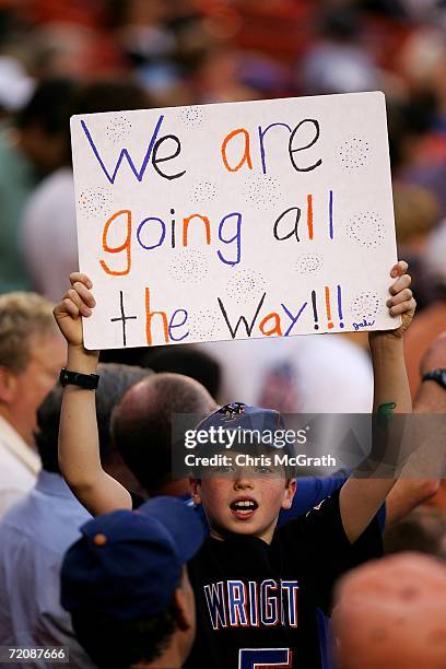 New York Mets Fan Holds Up A Sign Photos And Premium High Res Pictures Getty Images