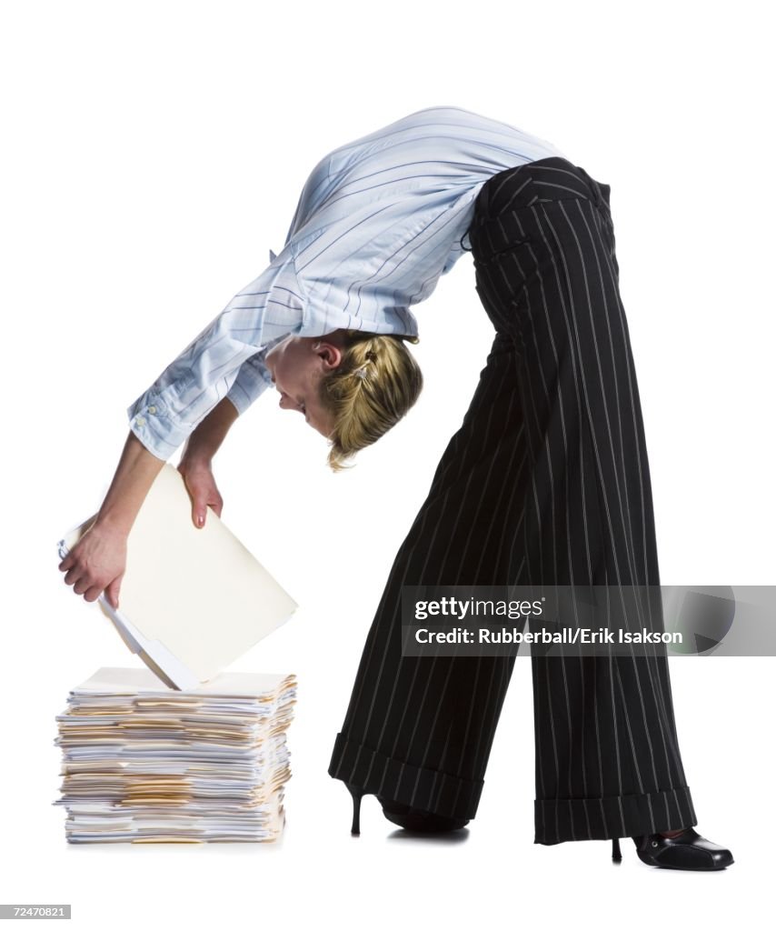 Female Contortionist Businesswoman Bending Over Backwards High Res