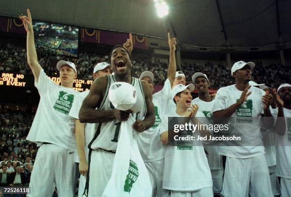 Mateen Cleaves of Michigan State celebrates with his teammates after ... Mateen Cleaves of Michigan State celebrates with his teammates after ...