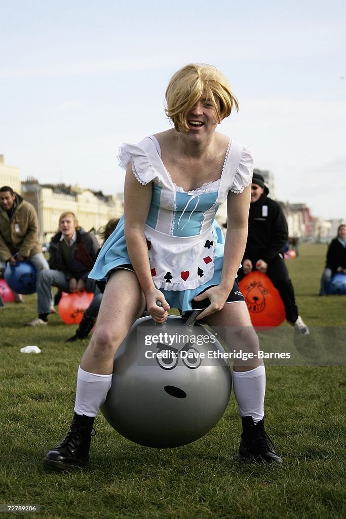 Contestants Race On Space Hoppers During The Bounce Your Balls For