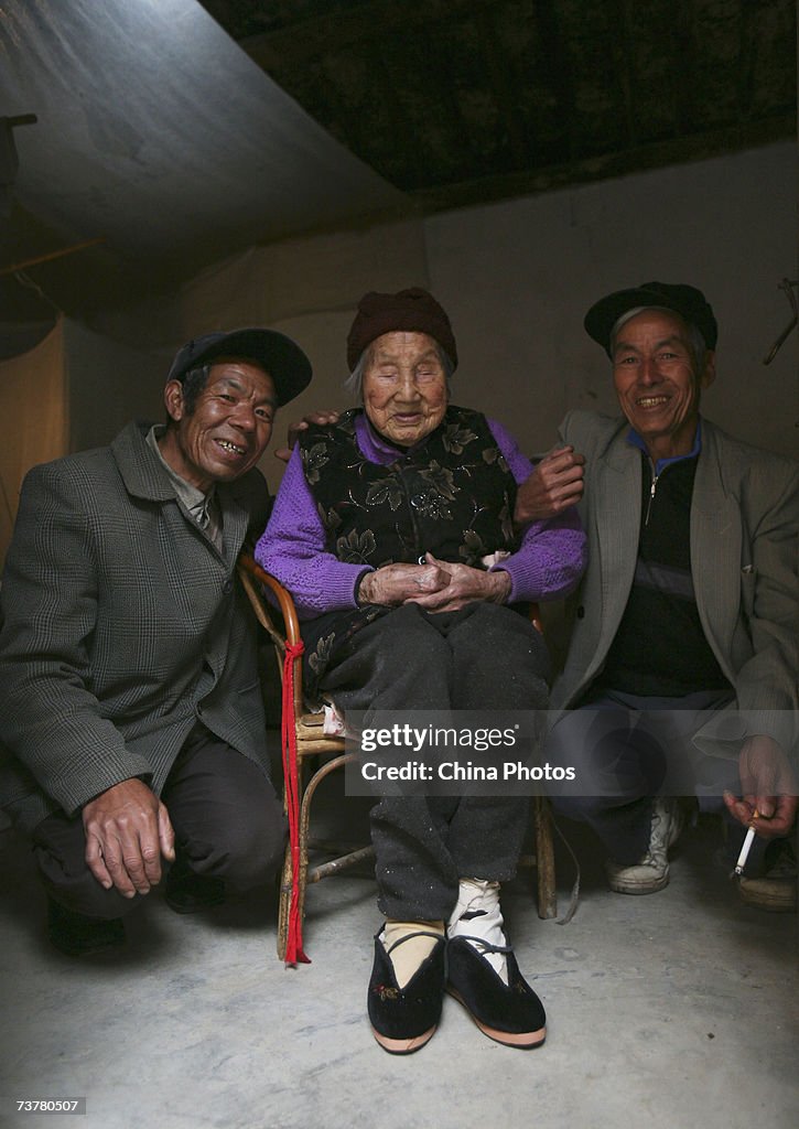 100 Year Old Bound Feet Woman Whose Surname Is Luo Pu Poses For