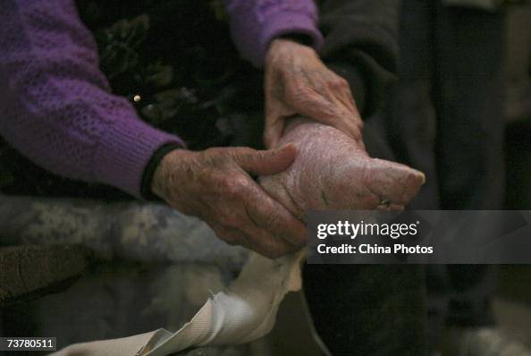 100 Year Old Bound Feet Woman Whose Surname Is Luo Pu Displays Her