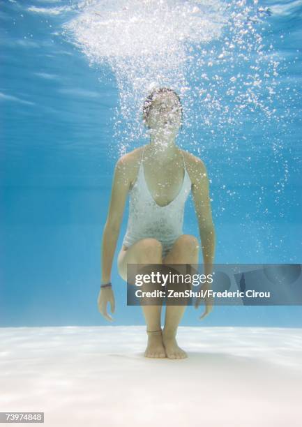 Girl Underwater Holding Breath Photos And Premium High Res Pictures