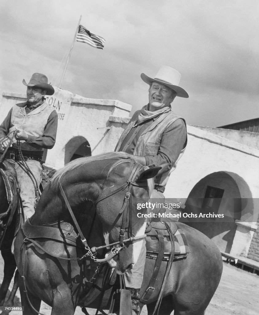 John Wayne And Ben Johnson On The Set Of Chisum Directed By Andrew