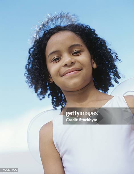 Portrait Of Young Girl Wearing Fancy Dress Costume Low Angle View