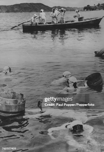 Japanese Ama Pearl Divers Off Mikimoto Pearl Island In Ise Bay