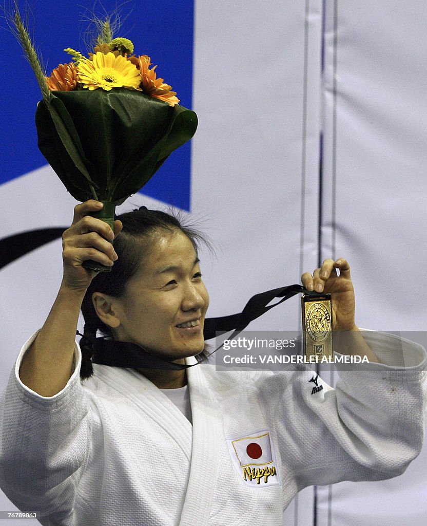Japans Ryoko Tani Celebrates On The Podium After Winning Gold In The