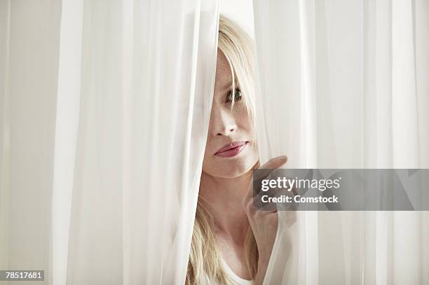 1,034 Peaking Through Curtain Stock Photos, High-Res Pictures, and ... 1,034 Peaking Through Curtain Stock Photos, High-Res Pictures, and ...