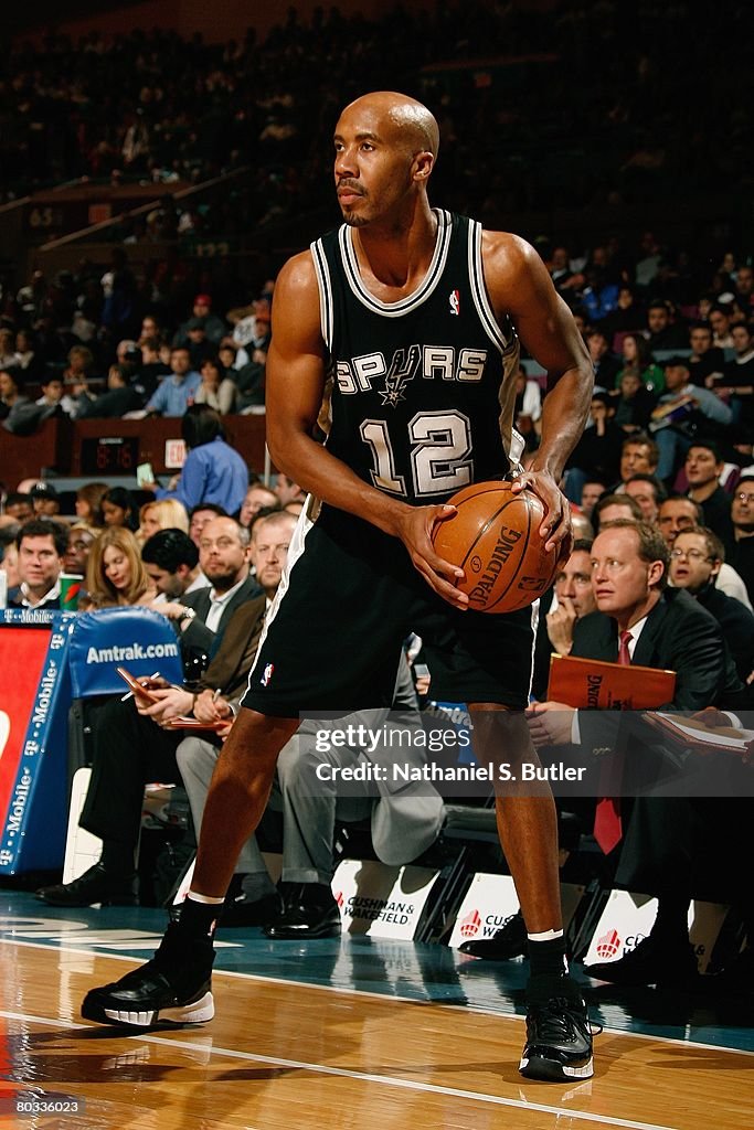 Bruce Bowen Of The San Antonio Spurs Holds The Ball Against The New