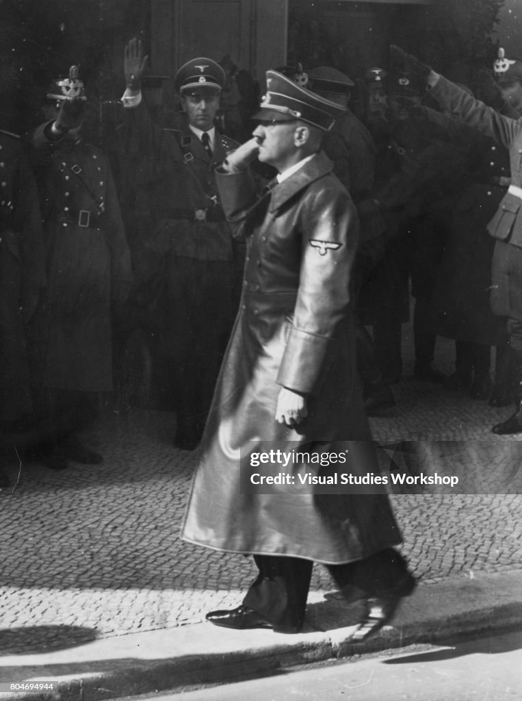 Austrian Born German Dictator Adolf Hitler Salutes Uniformed Officers