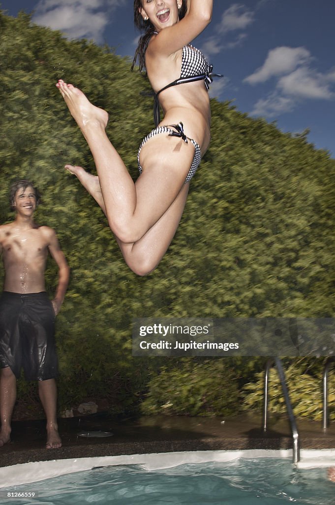 Teenage Girl Jumping Into Pool High-Res Stock Photo - Getty Images Teenage Girl Jumping Into Pool High-Res Stock Photo - Getty Images
