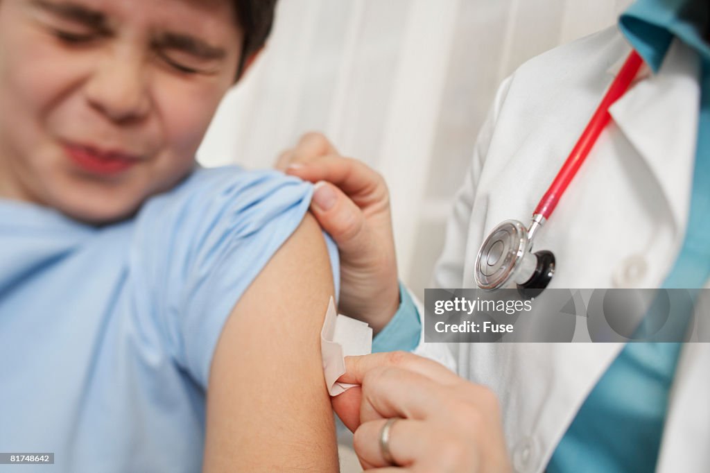 Boy Getting Shot High-Res Stock Photo - Getty Images Boy Getting Shot High-Res Stock Photo - Getty Images