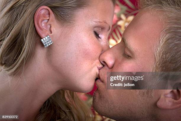Young Couple Kissing Lips Photos And Premium High Res Pictures Getty