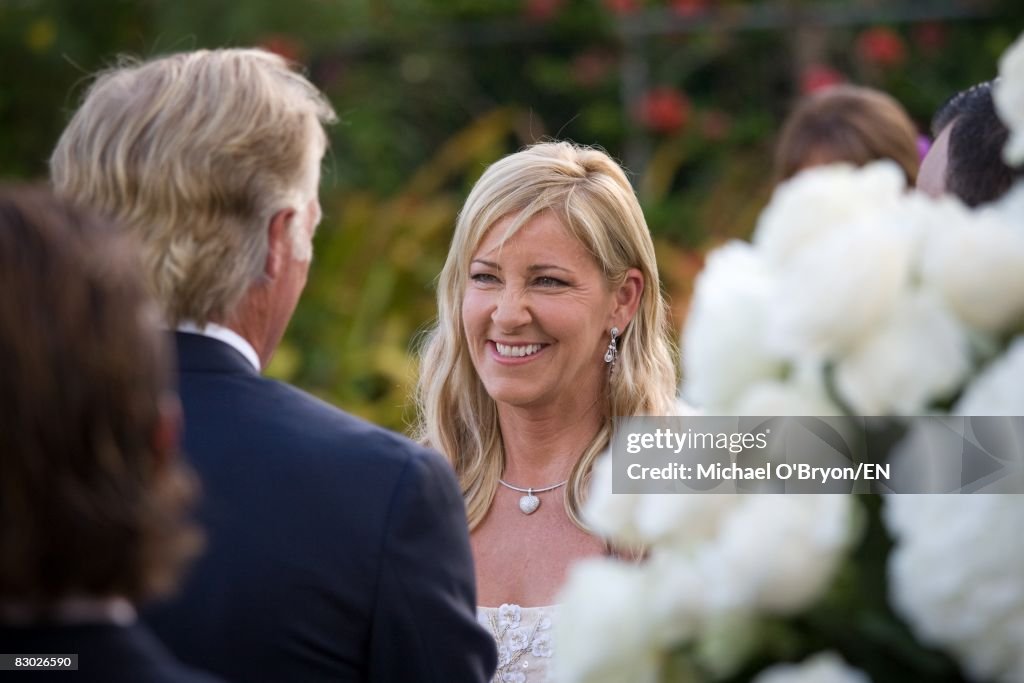 Golf Pro Greg Norman And Tennis Player Chris Evert Stand At The Alter News Photo Getty Images