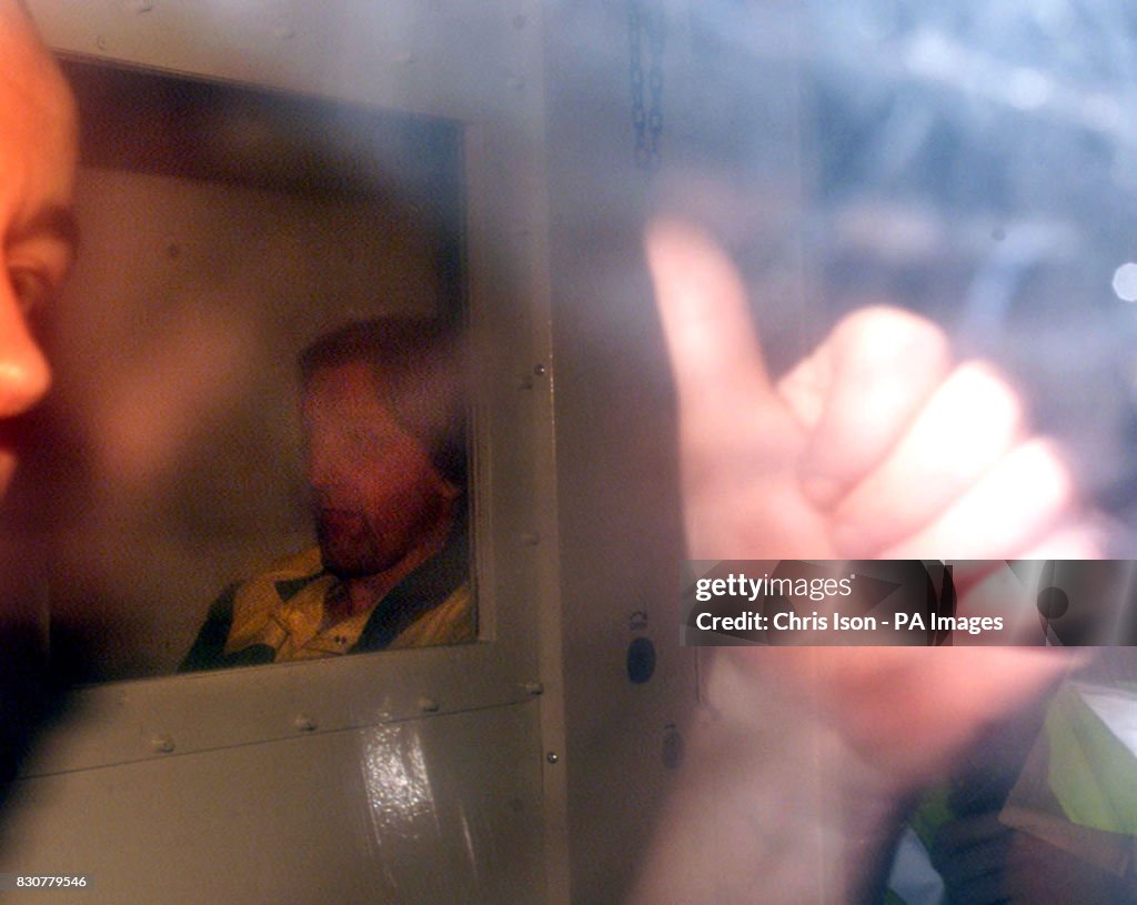 A Prison Guard Escorting Roy Whiting Gives The Thumbs Up To News