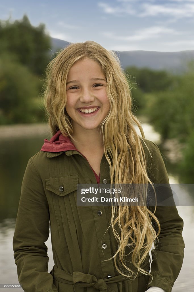 Portrait Of Smiling Girl Outdoors High-Res Stock Photo - Getty Images Portrait Of Smiling Girl Outdoors High-Res Stock Photo - Getty Images