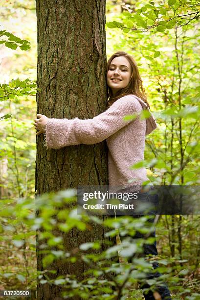 Tree Hugging Woman Photos And Premium High Res Pictures Getty Images