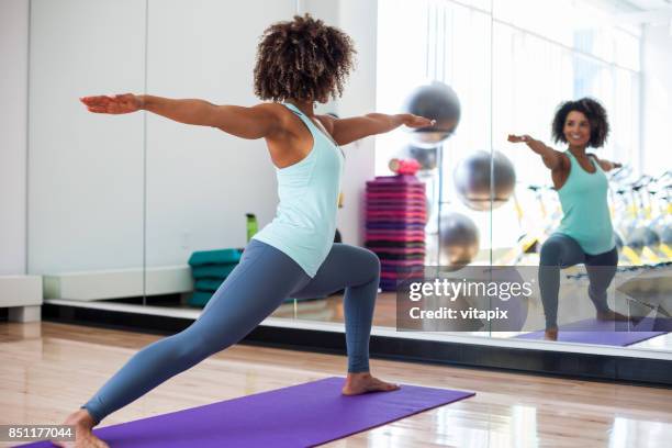 Warrior Pose Yoga Class Photos And Premium High Res Pictures Getty Images