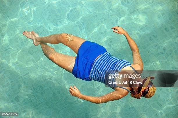 Older Woman Pool Float Photos And Premium High Res Pictures Getty Images