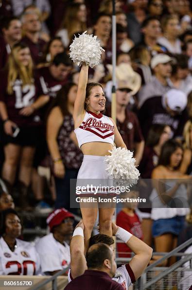 An Alabama Crimson Tide Cheerleader Performs During The College News